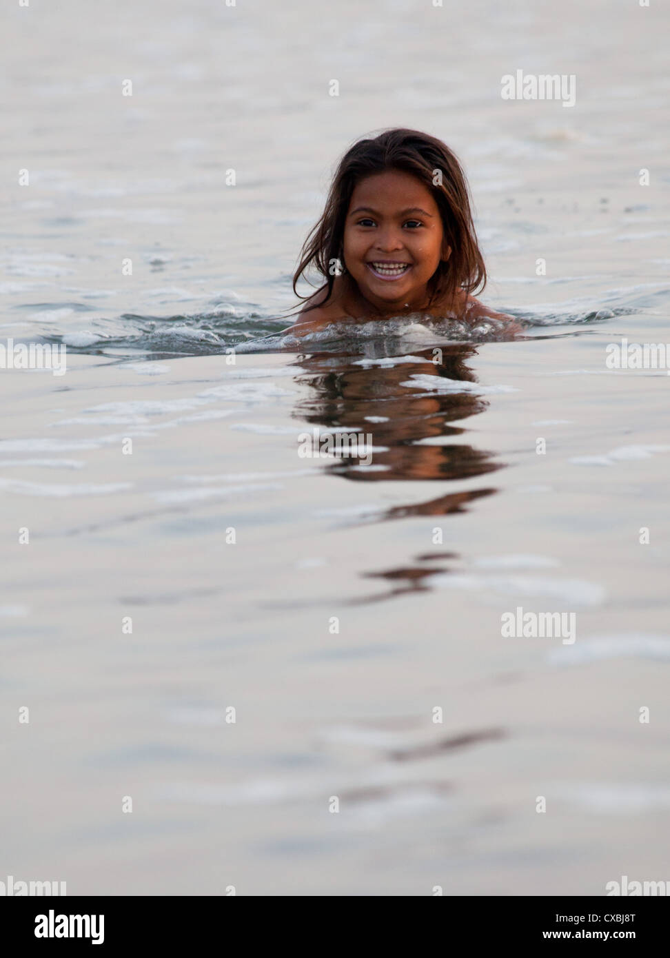 Nepali girl swimming in a river, Bardia National Park, Nepal Stock ...