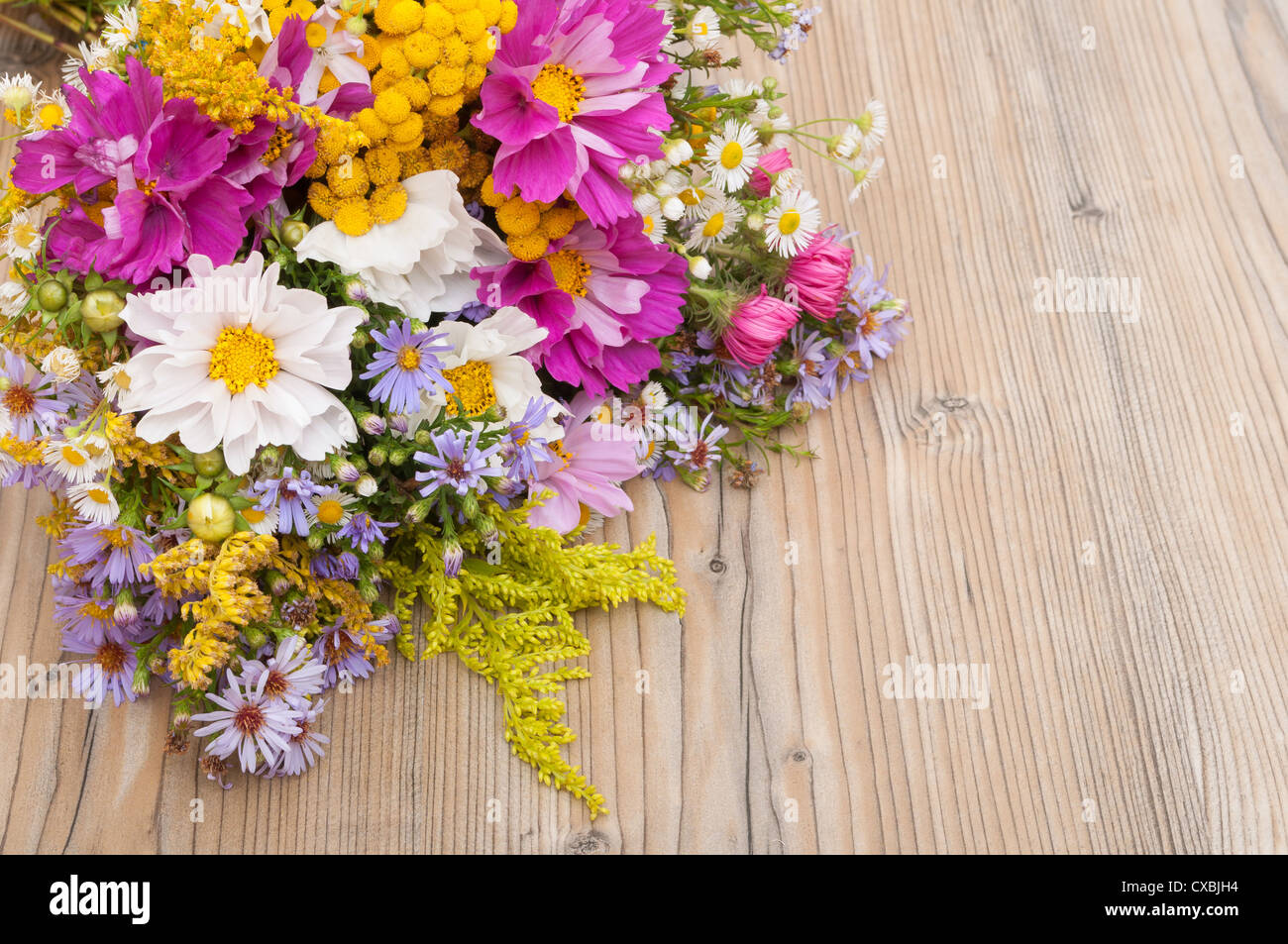 Bouquet of Wild Summer Flowers on Wooden Table Stock Photo - Alamy