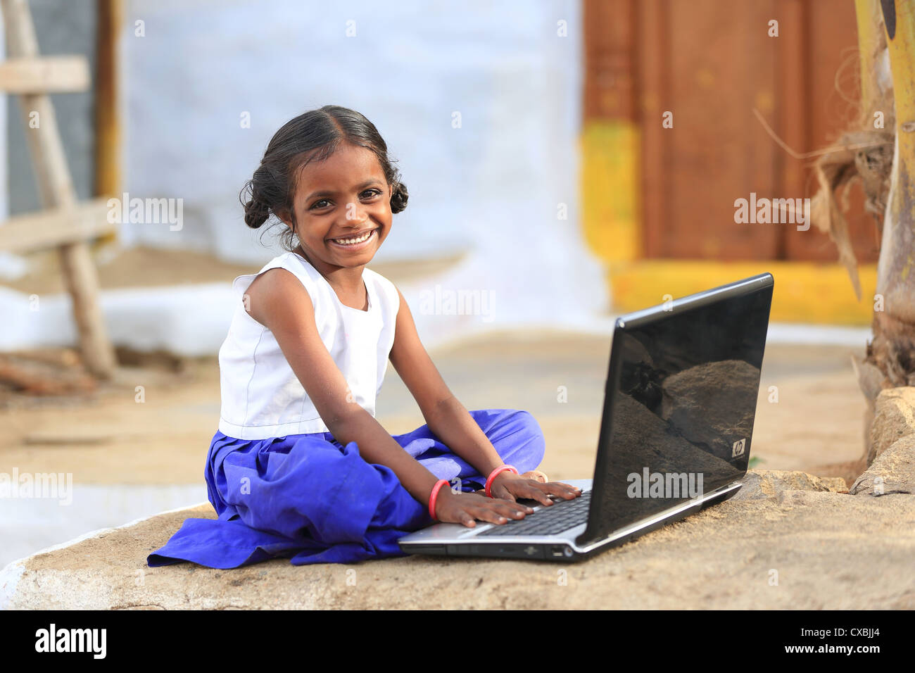 Computer notebook indian kid hi-res stock photography and images - Alamy