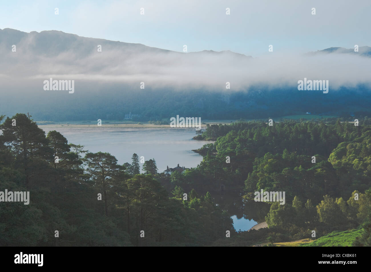 A corner of Derwentwater, morning mist, Lake District National Park ...