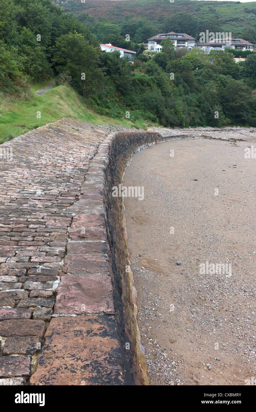 Defensive sea wall protecting against erosion Stock Photo - Alamy