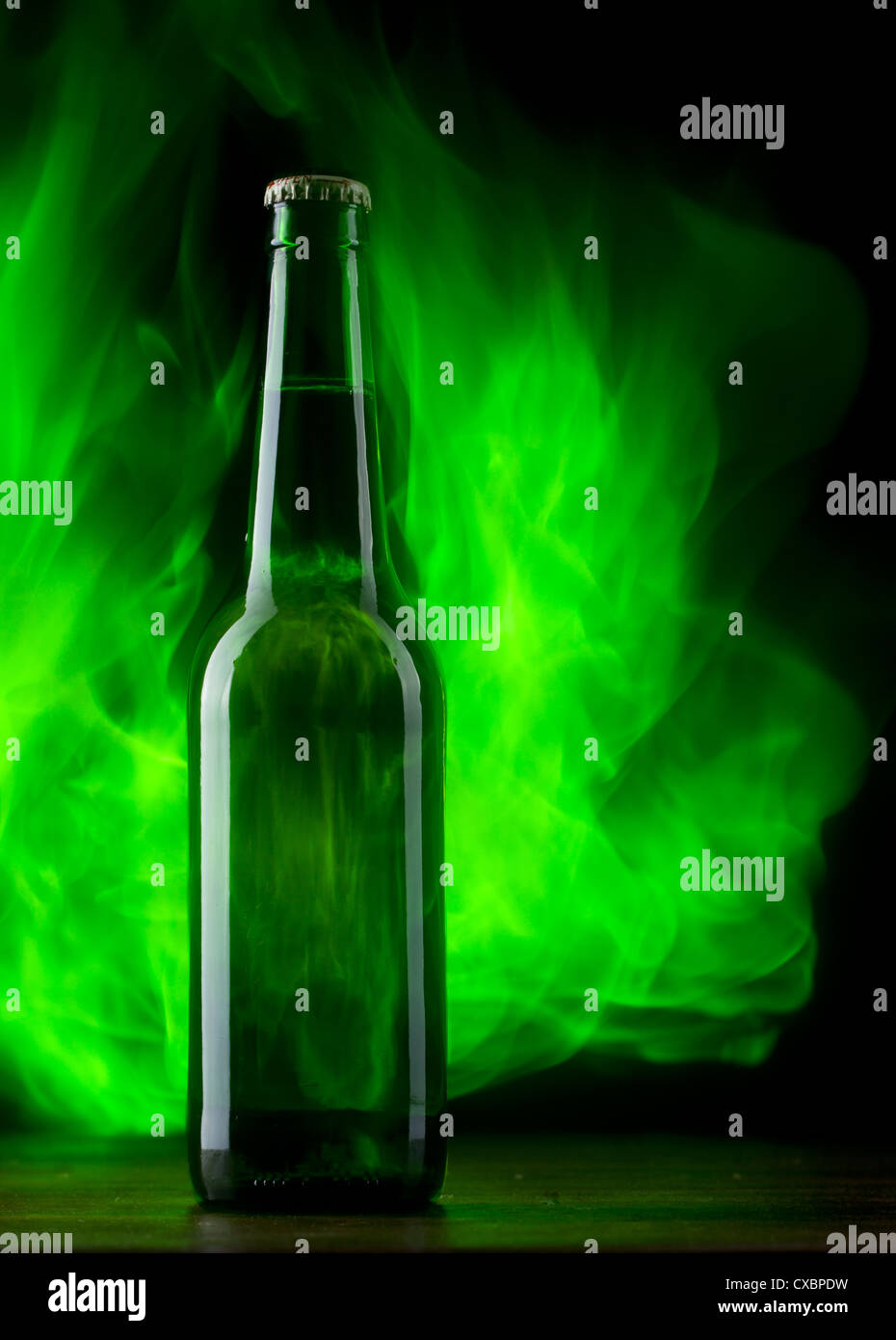 Beer bottle with color fire Stock Photo - Alamy