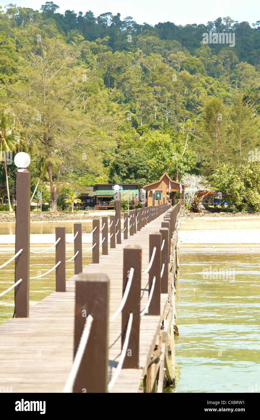 jetty walkway to tropical rainforest island Stock Photo - Alamy