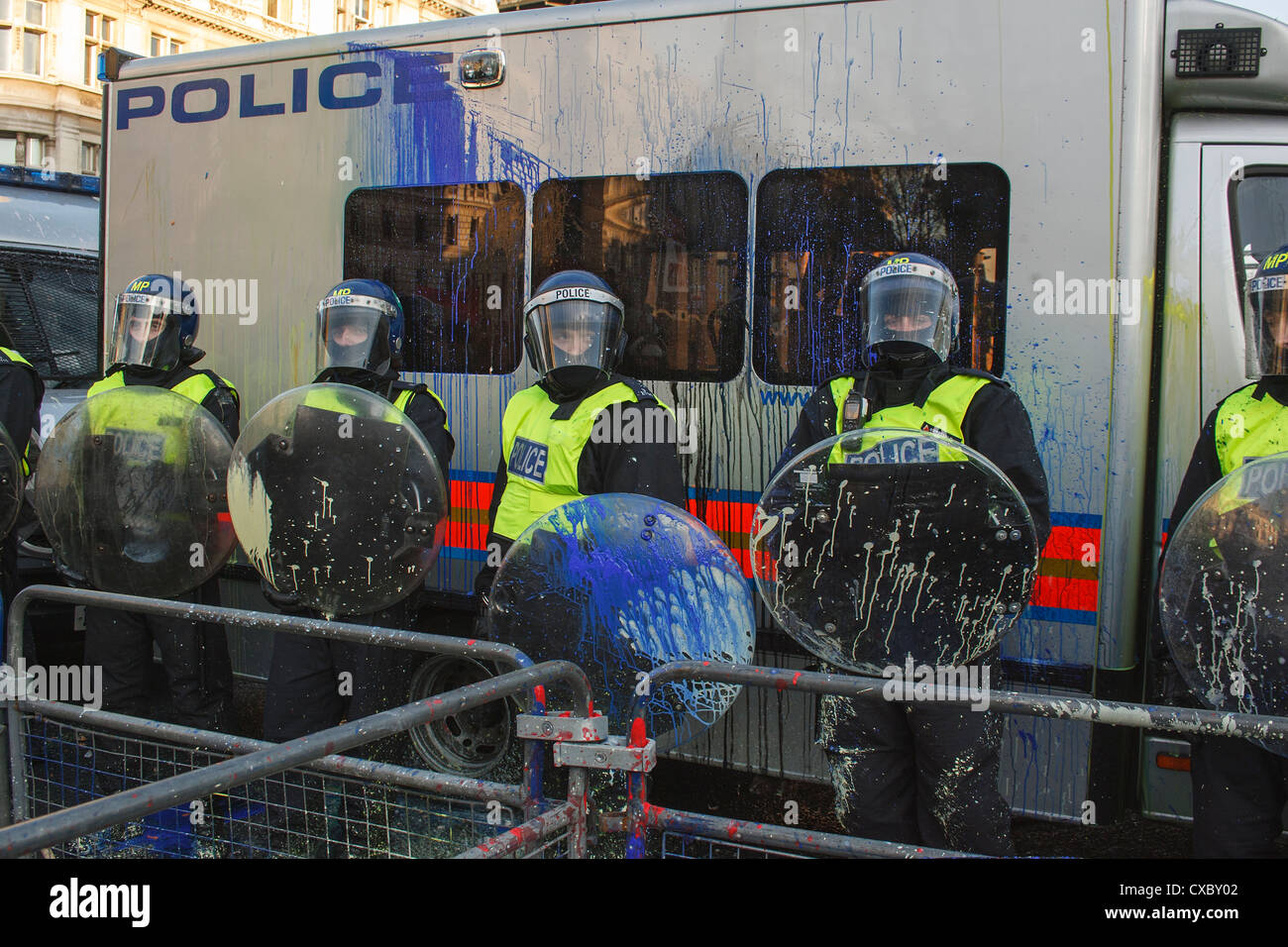 Paint splattered British Riot police stand in Parliament Square during ...