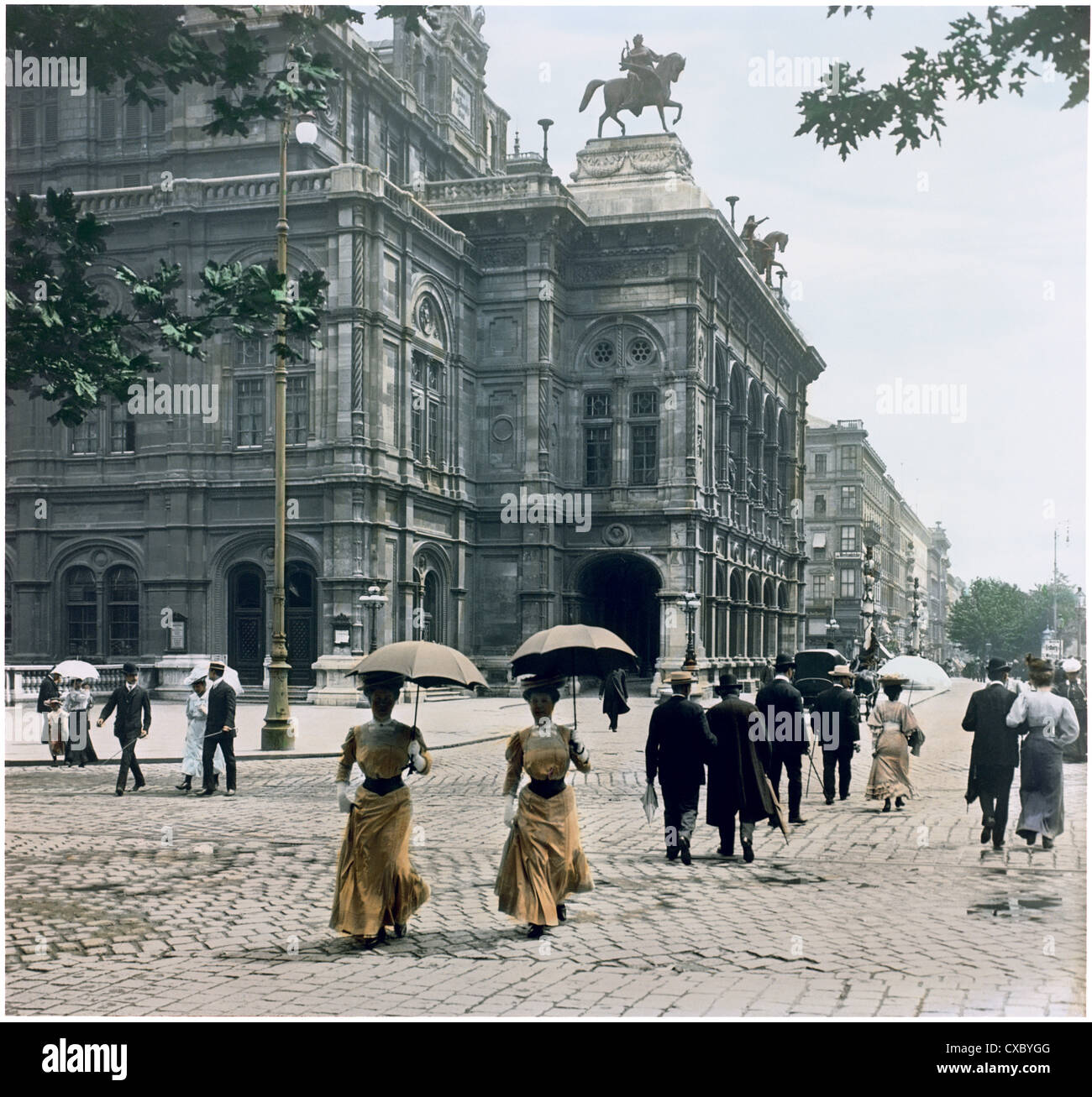 Colorized view of pedestrians walking along the Opernring in front of ...