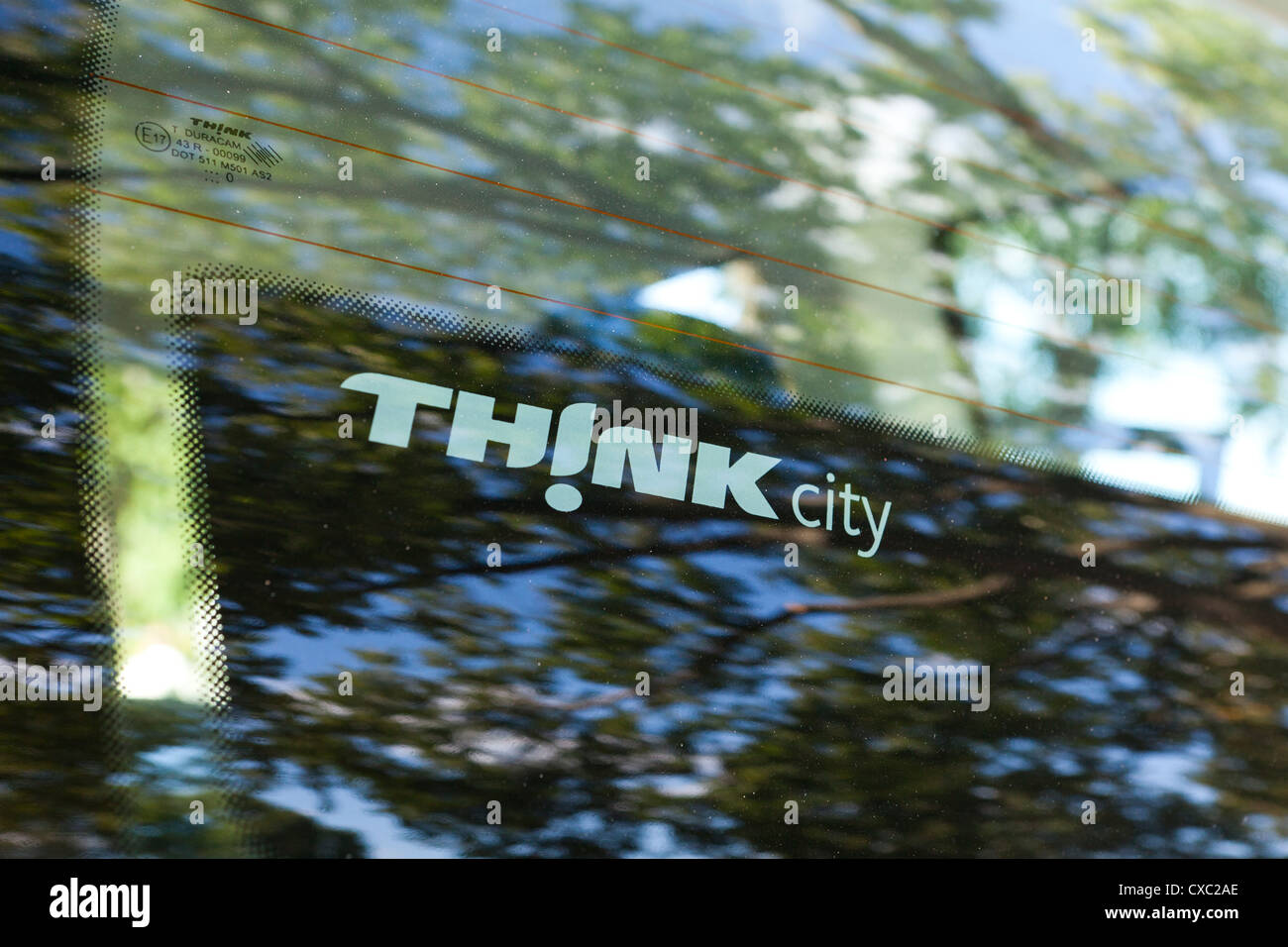Think City electric car logo on windshield Stock Photo - Alamy