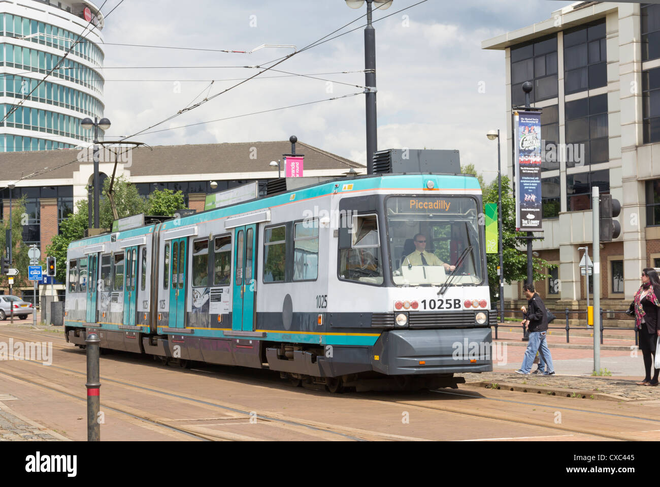 T-68 tram 1025 passing through the Salford Quays area on the Metrolink ...