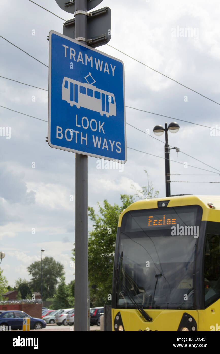 Pedestrian crossing warning sign on the Metrolink light railway/tram ...