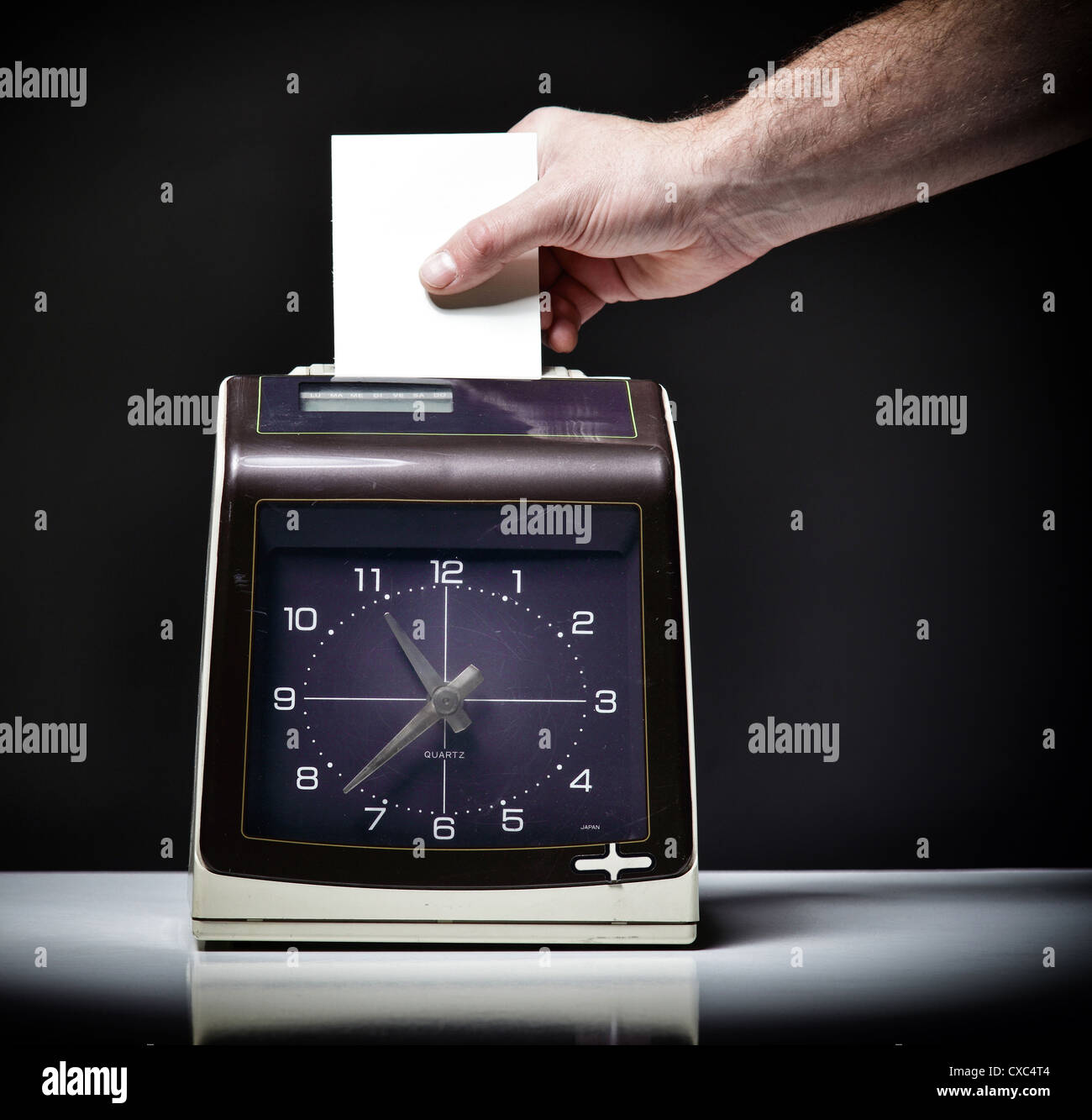Clock card machine hi-res stock photography and images - Alamy
