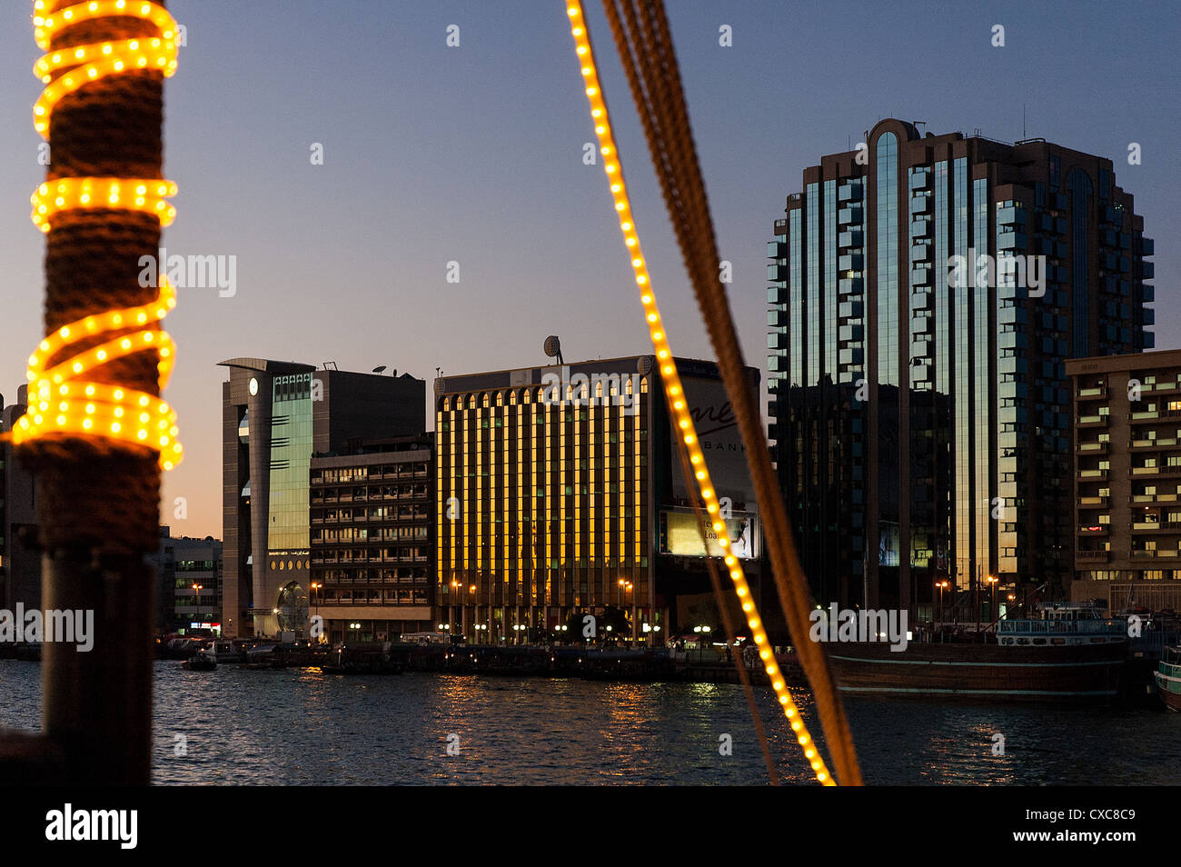 Night view on quay of Dubai Stock Photo - Alamy