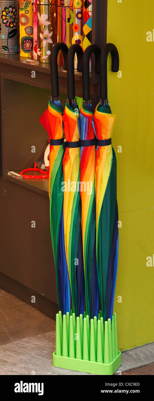 Colourful umbrellas in shop doorway Stock Photo - Alamy