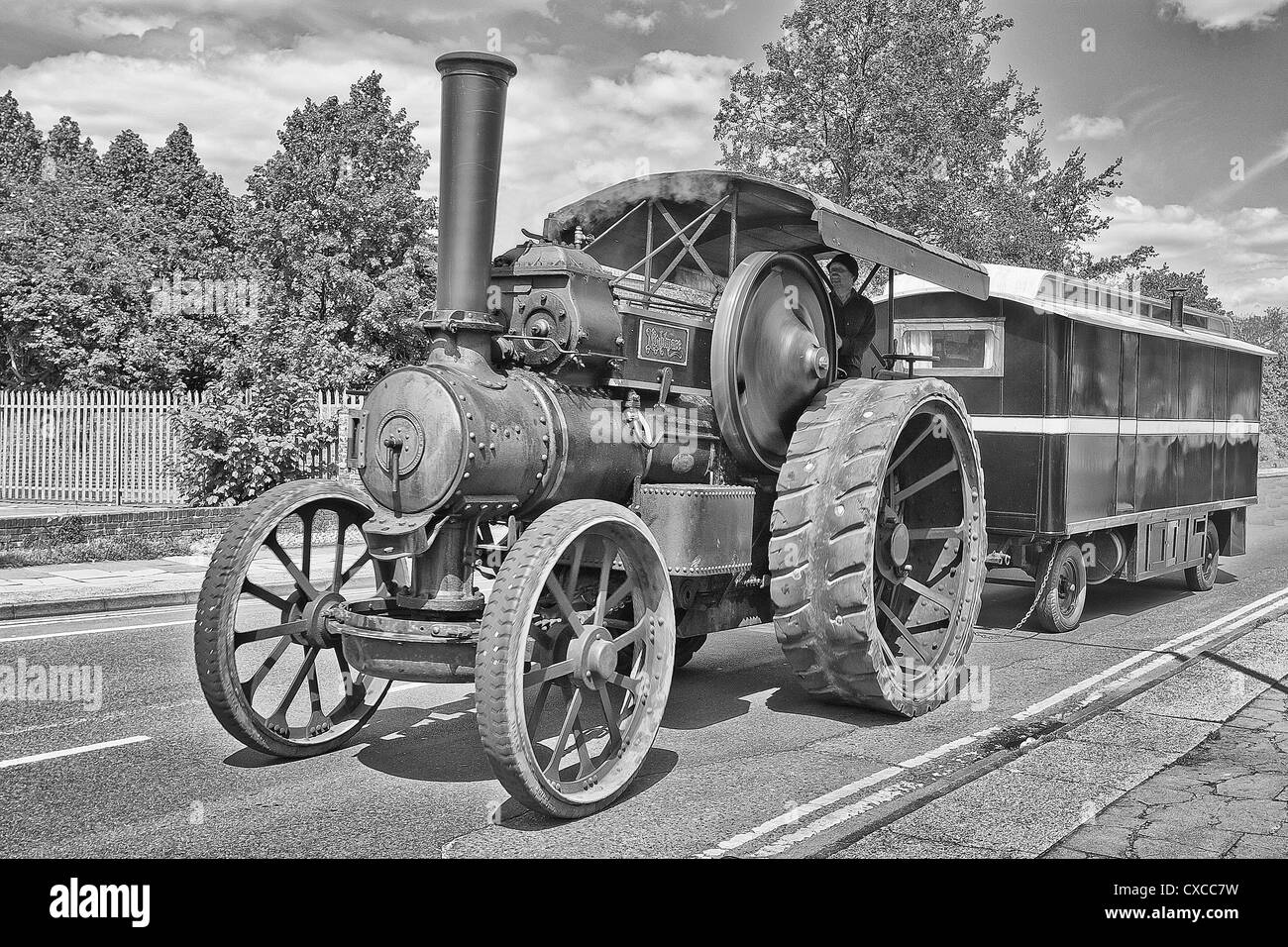 A black and white image of an old steam engine during Trevithick ...