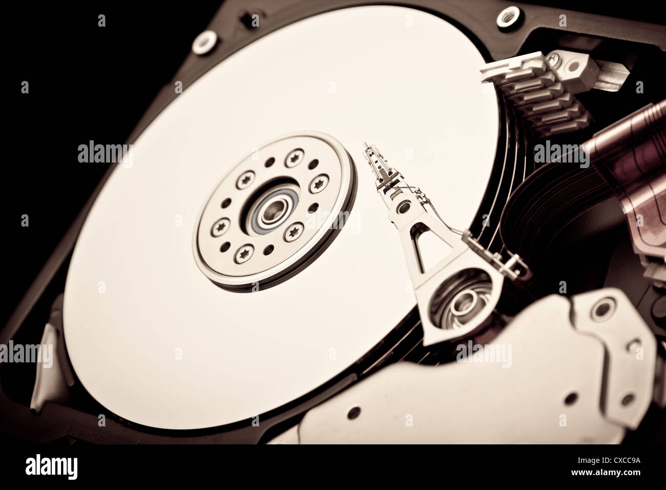 an opened hard disk on black background Stock Photo - Alamy