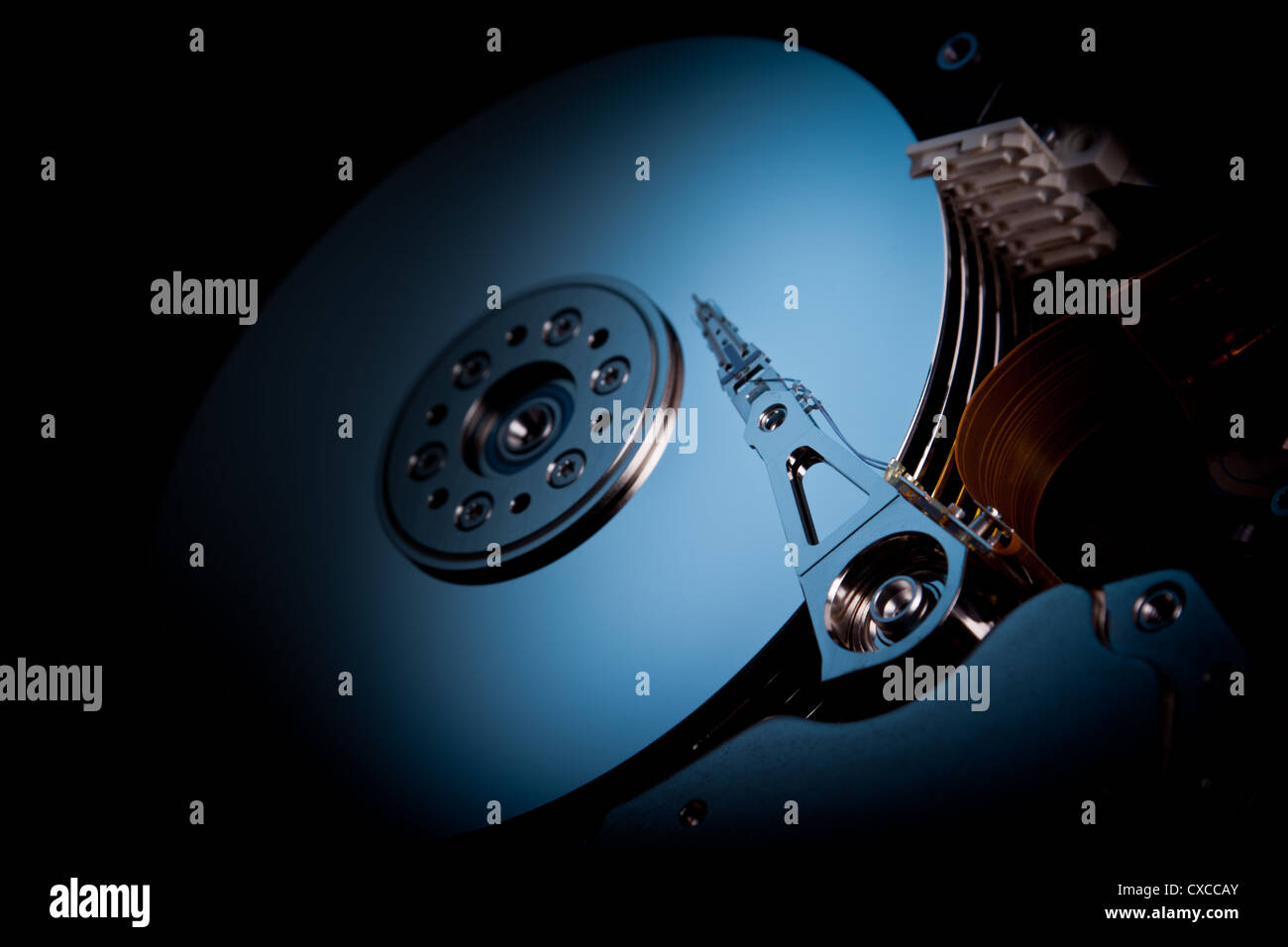 an opened hard disk on black background Stock Photo - Alamy