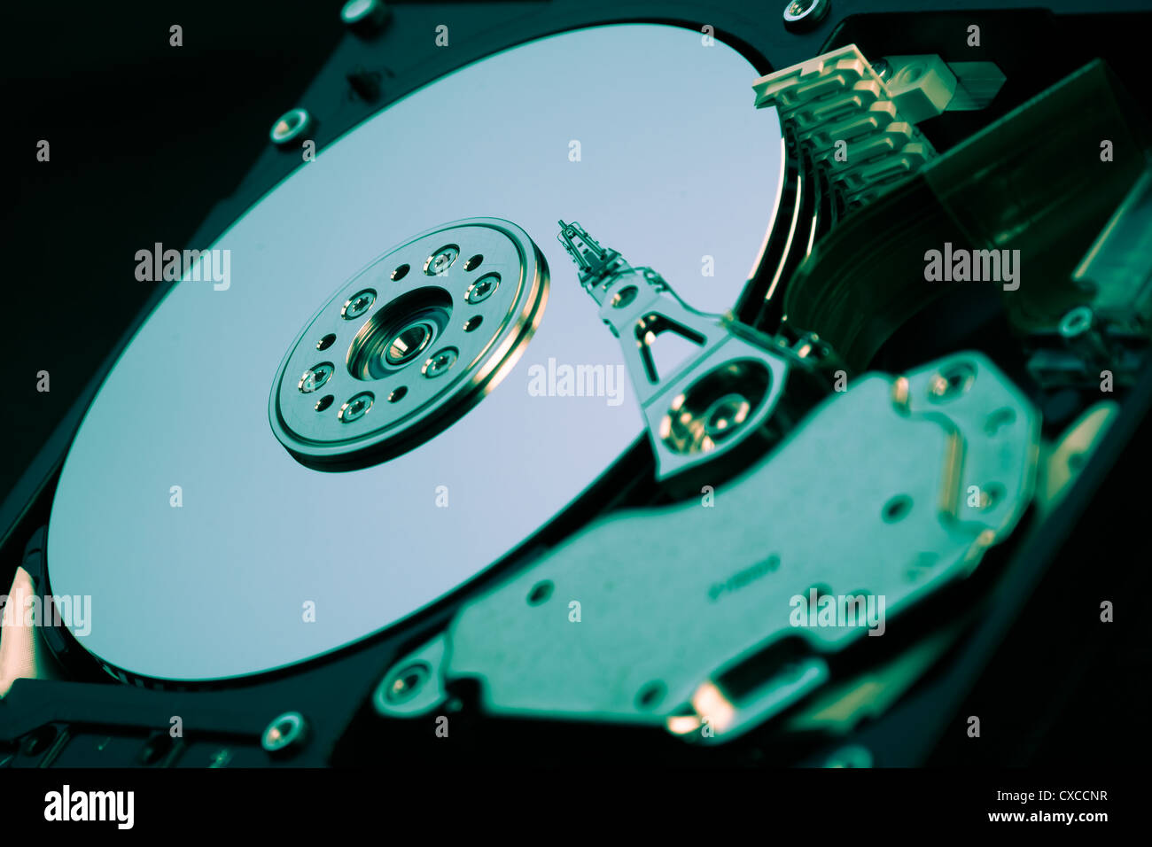 an opened hard disk on black background Stock Photo - Alamy