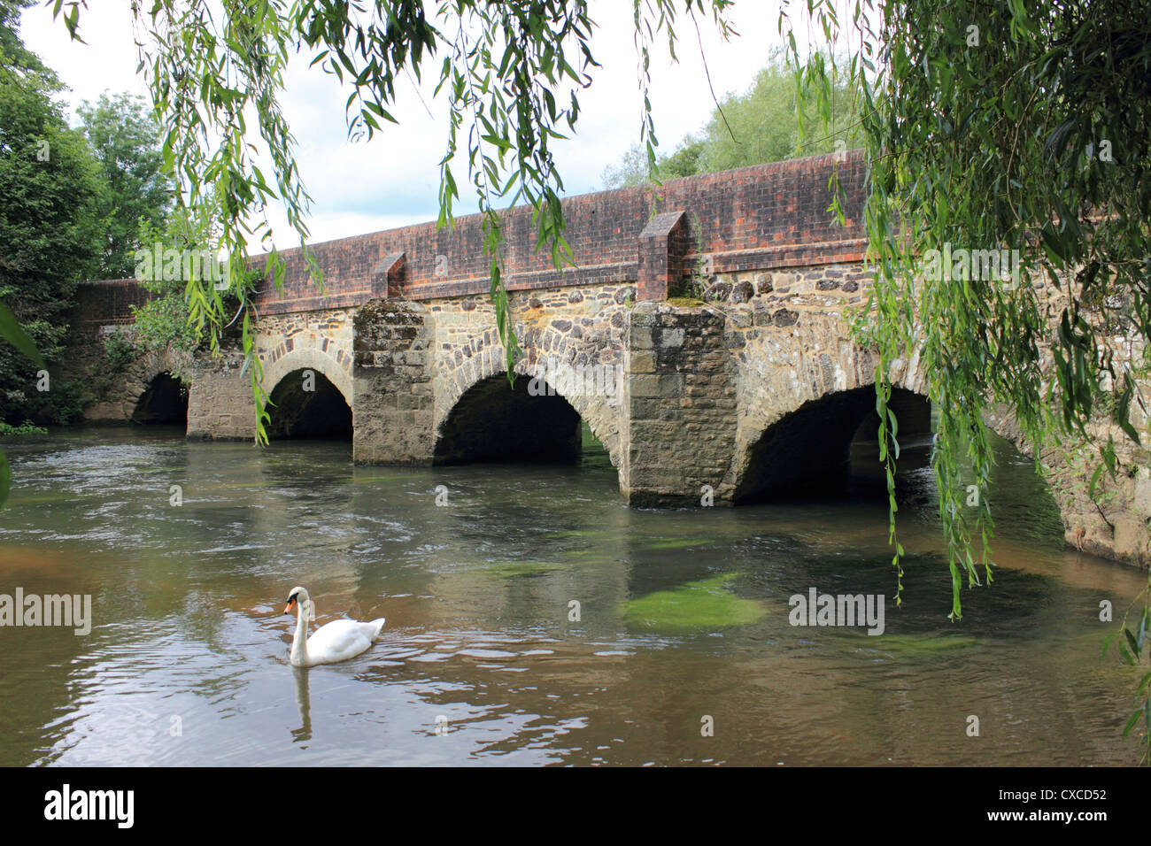 Old bridge over the River Wey at Elstead near Farnham Surrey England UK ...
