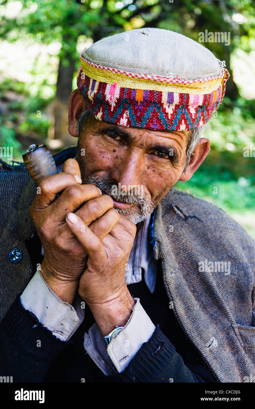 Portrait of Himachali man smoking chillum. Rumsu,Nagar, India Stock ...