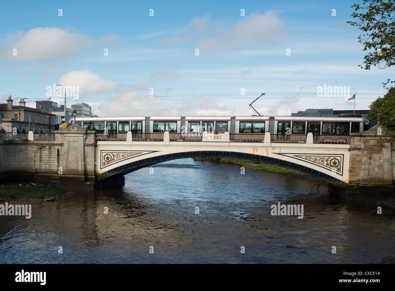 LUAS Tram on the Sean Heuston Bridge Over the River Liffey, Dublin City ...
