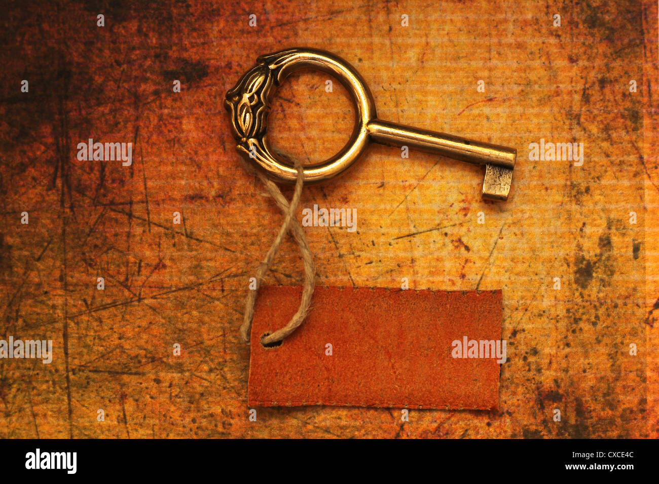 Old key and tag Stock Photo - Alamy