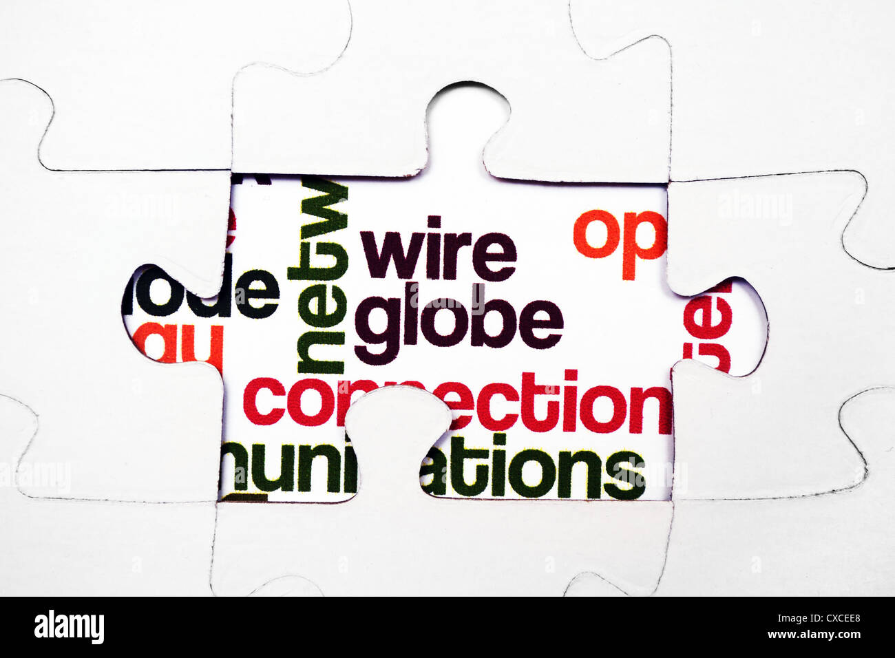 Wire globe text on puzzle Stock Photo - Alamy