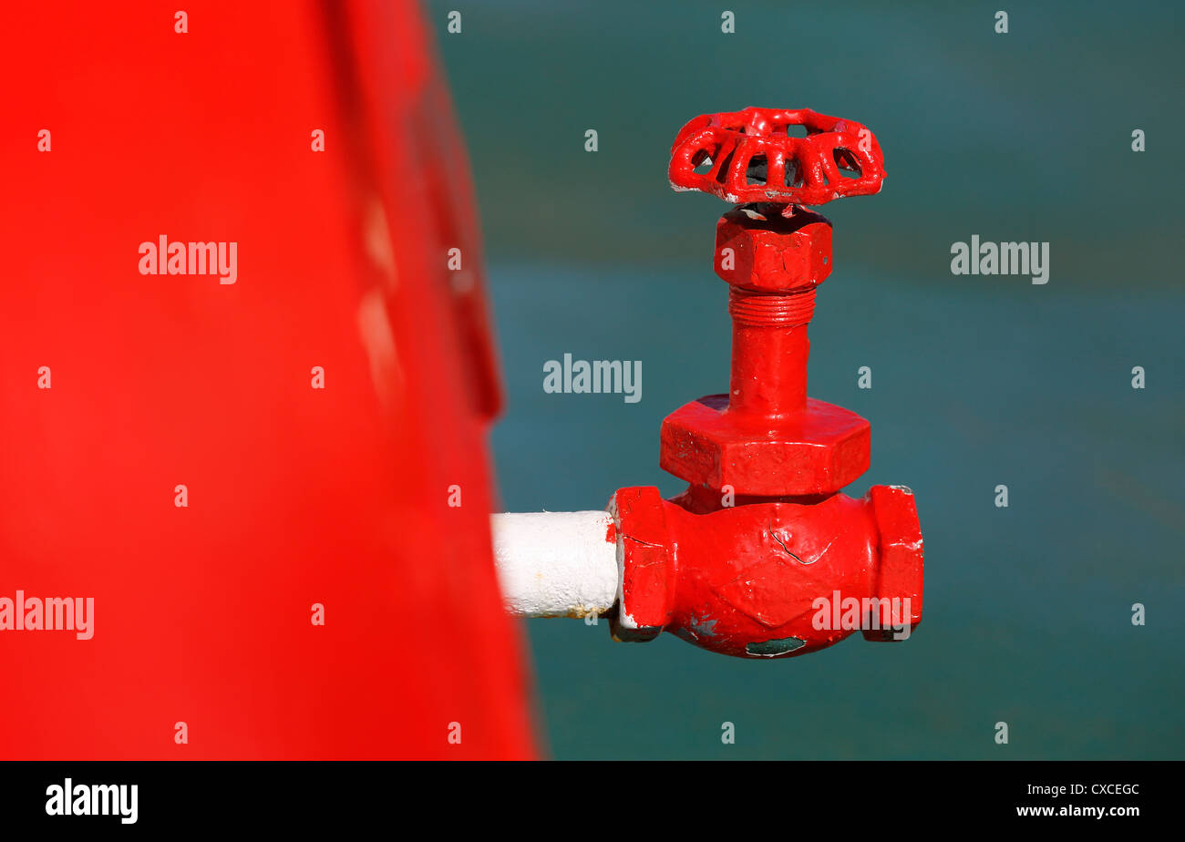 red water valve Stock Photo - Alamy