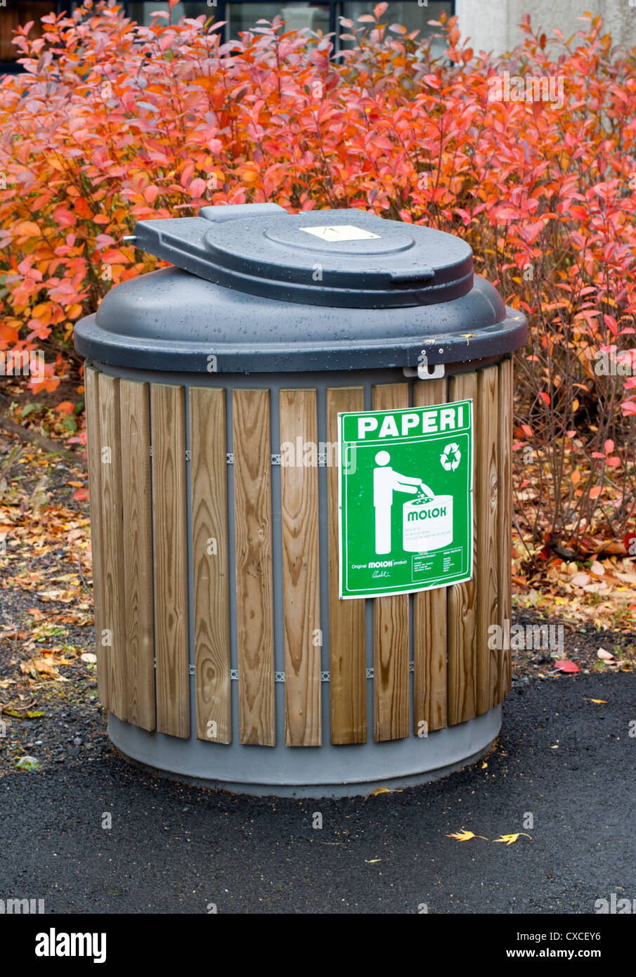 Wooden decorated recycling bin for recycled paper Stock Photo - Alamy