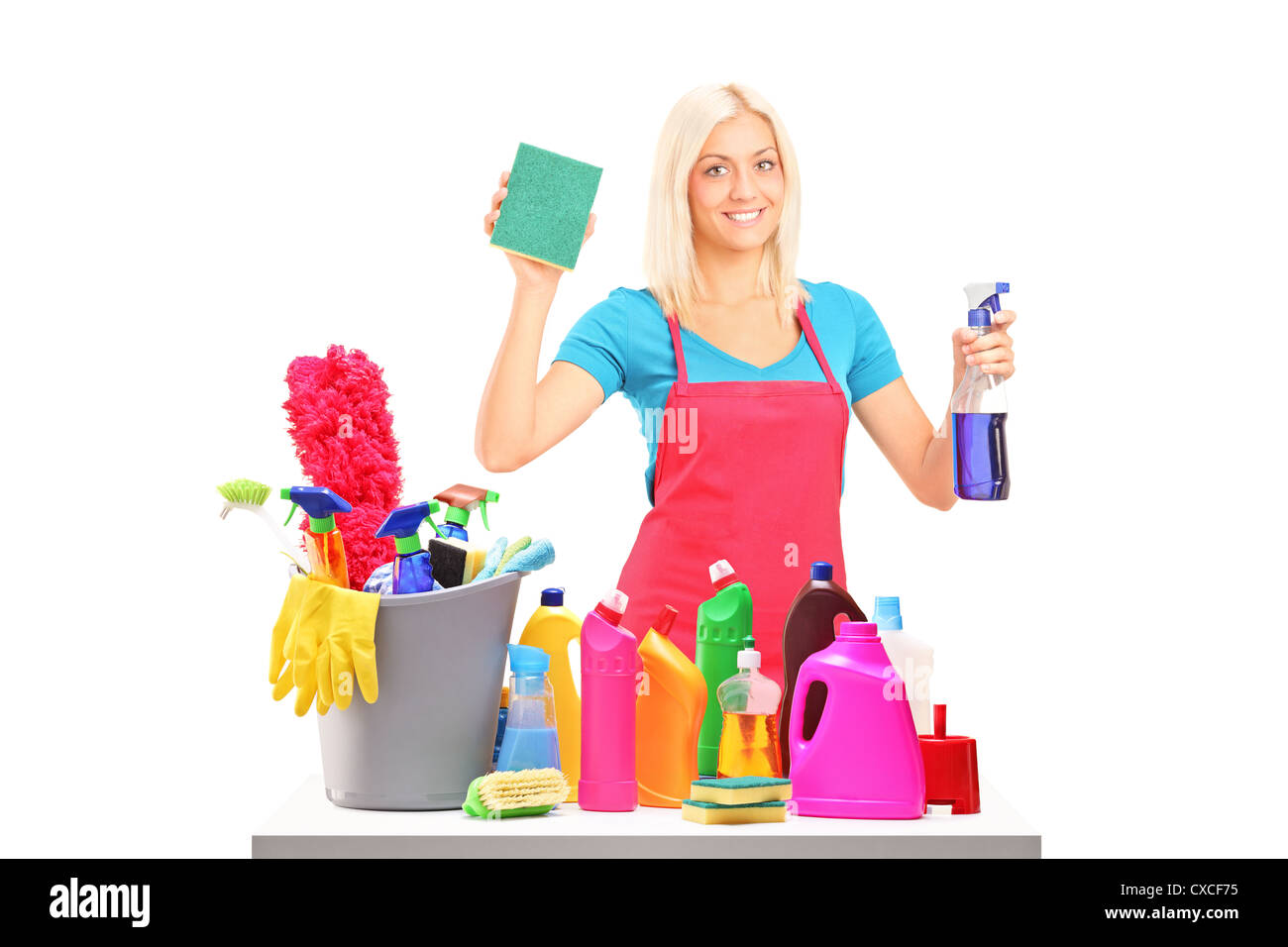 Young female cleaner with cleaning equipment isolated on white ...