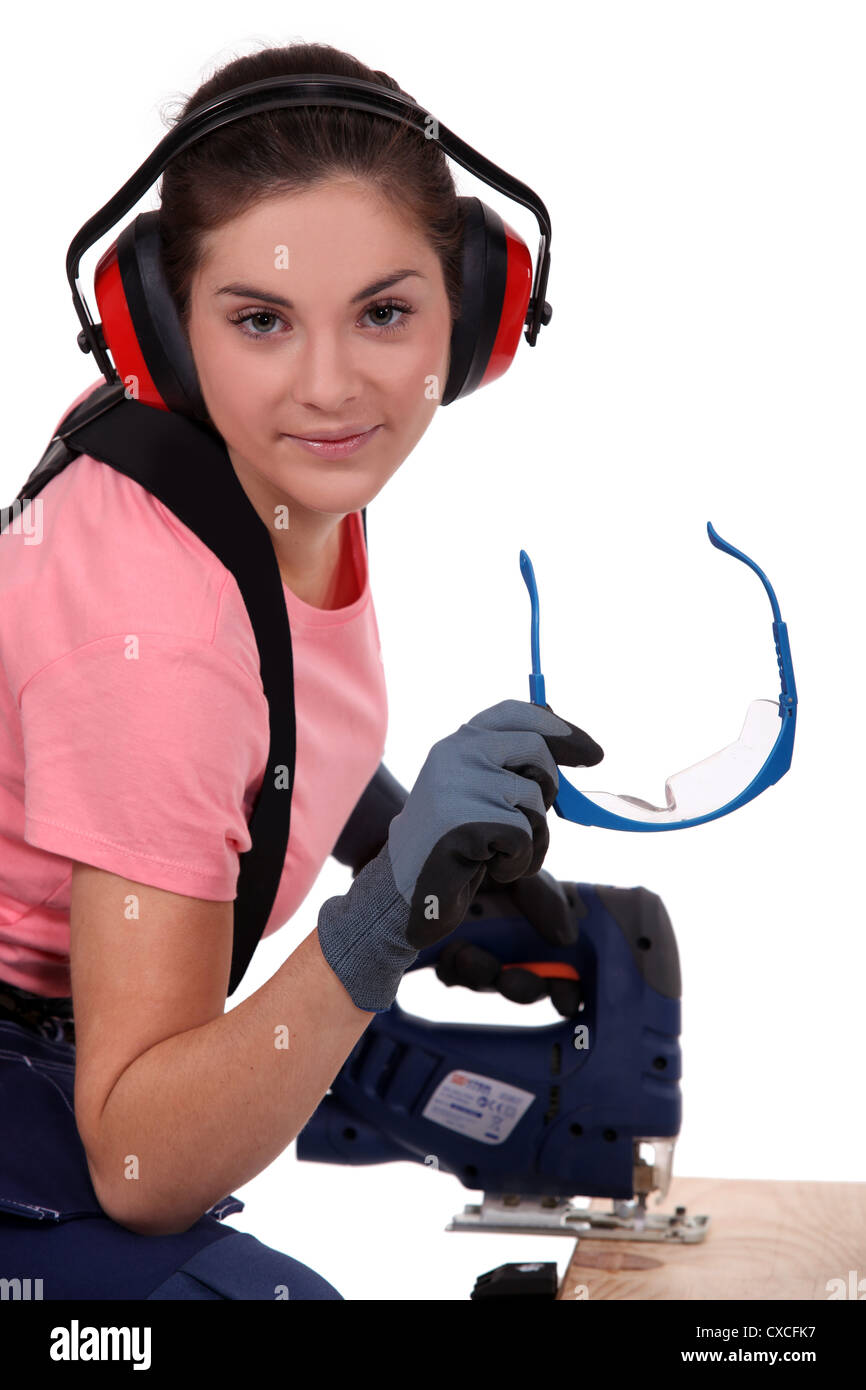 woman using band-saw Stock Photo - Alamy