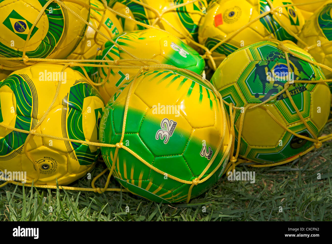 Collection of Brazilian footballs in a net Stock Photo - Alamy