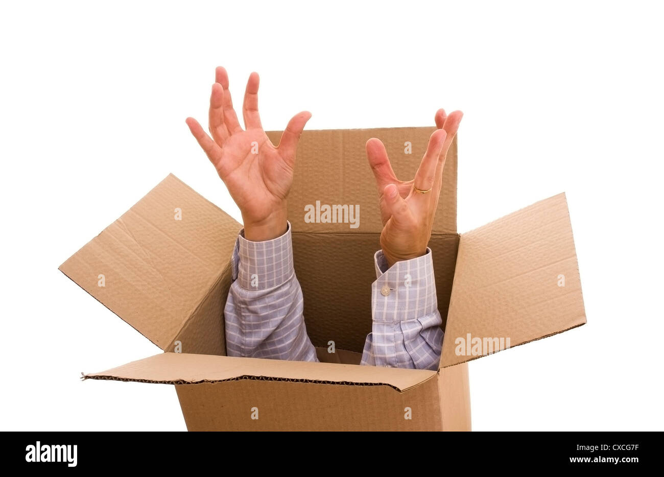 A business man inside of a cardboard box Stock Photo - Alamy