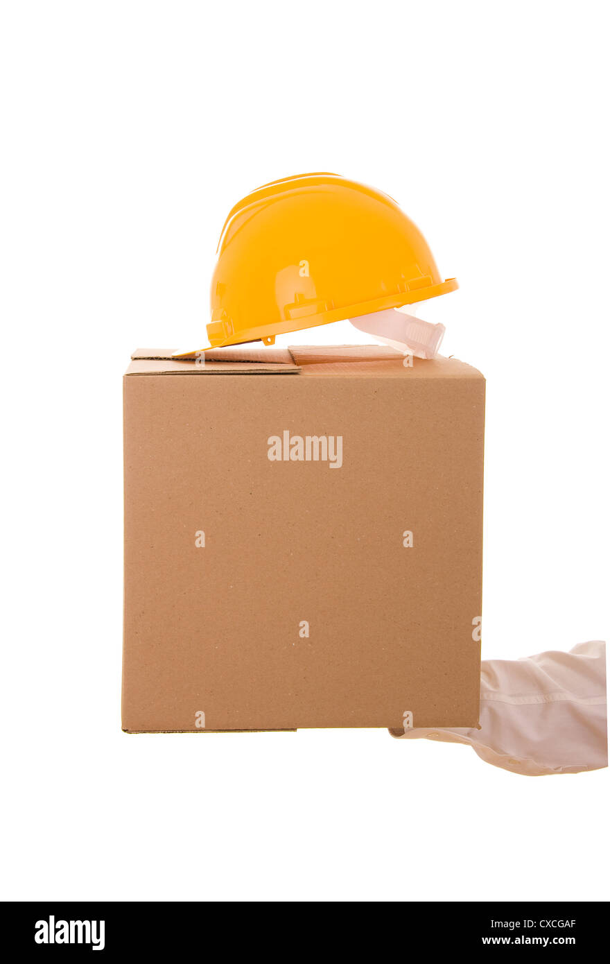 Hand carrying a cardboard box and a security helmet Stock Photo - Alamy
