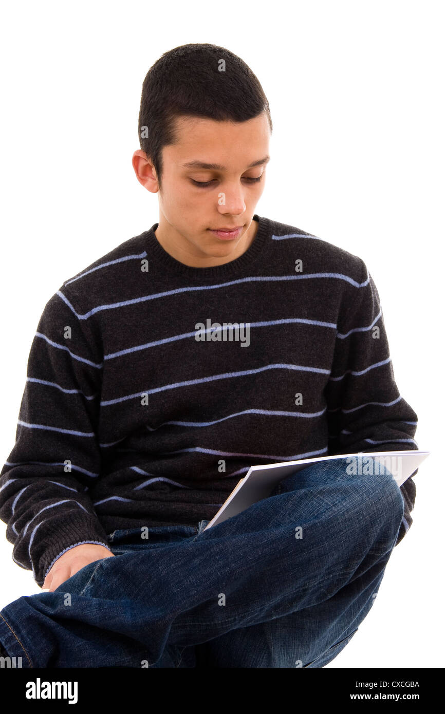A young student reading a book Stock Photo - Alamy