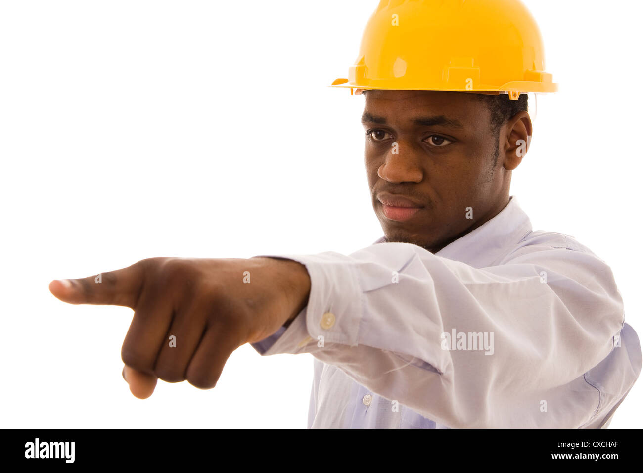 A black worker pointing with his finger to someone Stock Photo - Alamy