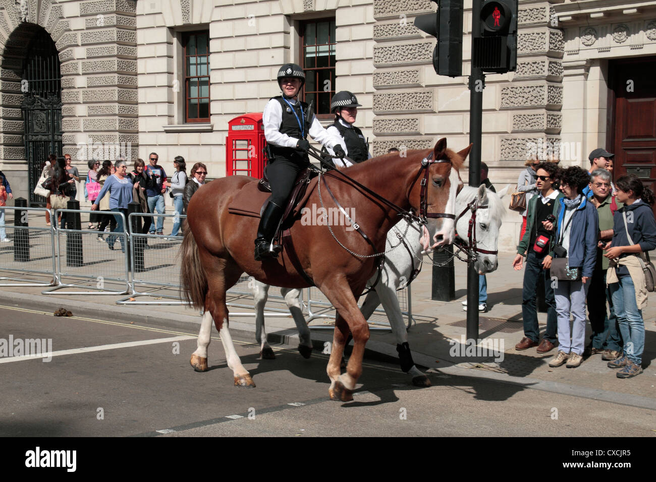 Female police officer riding horse hi-res stock photography and images ...