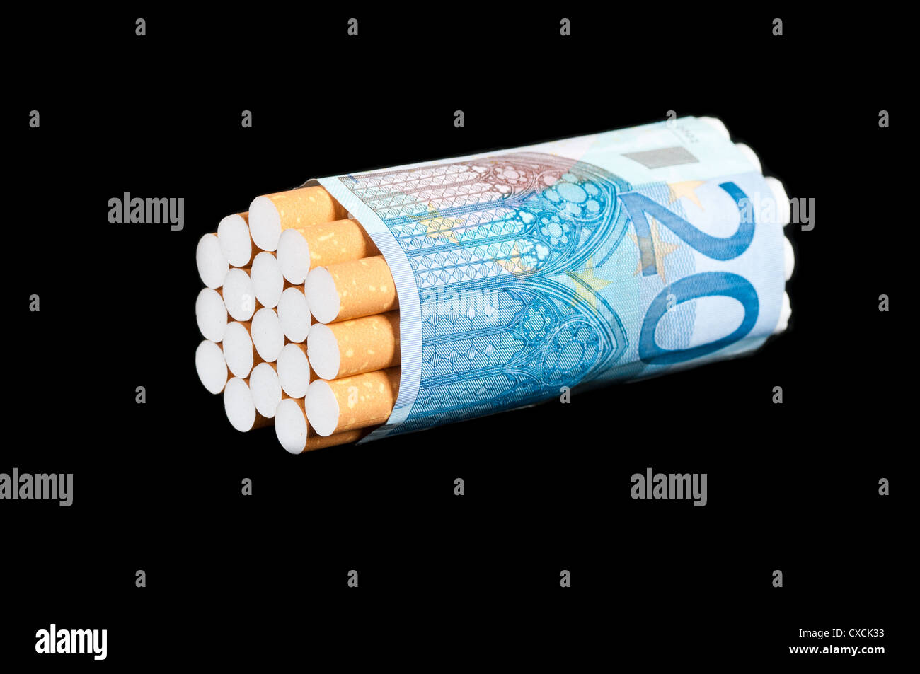 Cigarettes and money Stock Photo - Alamy