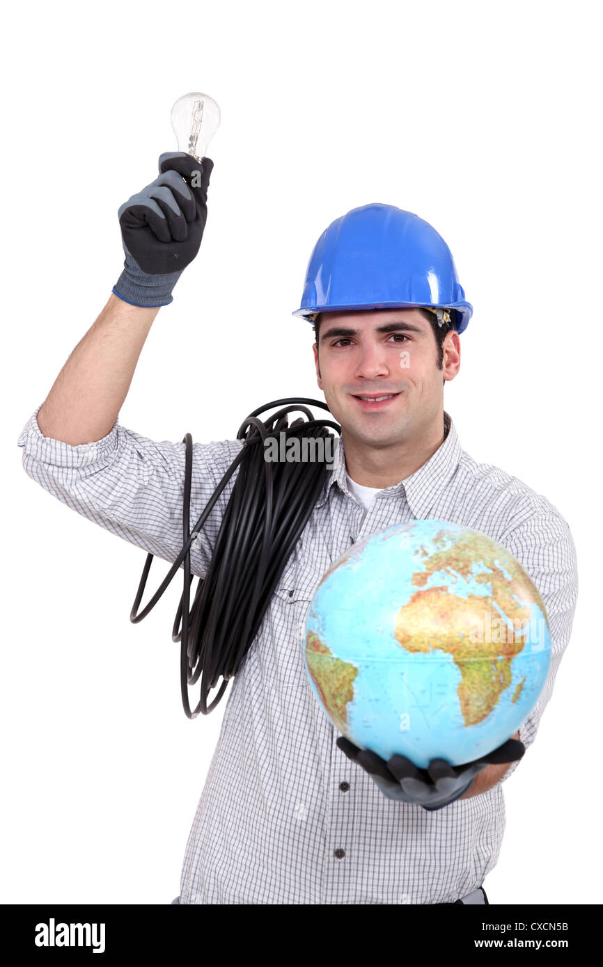 Electrician holding light bulb and globe Stock Photo - Alamy