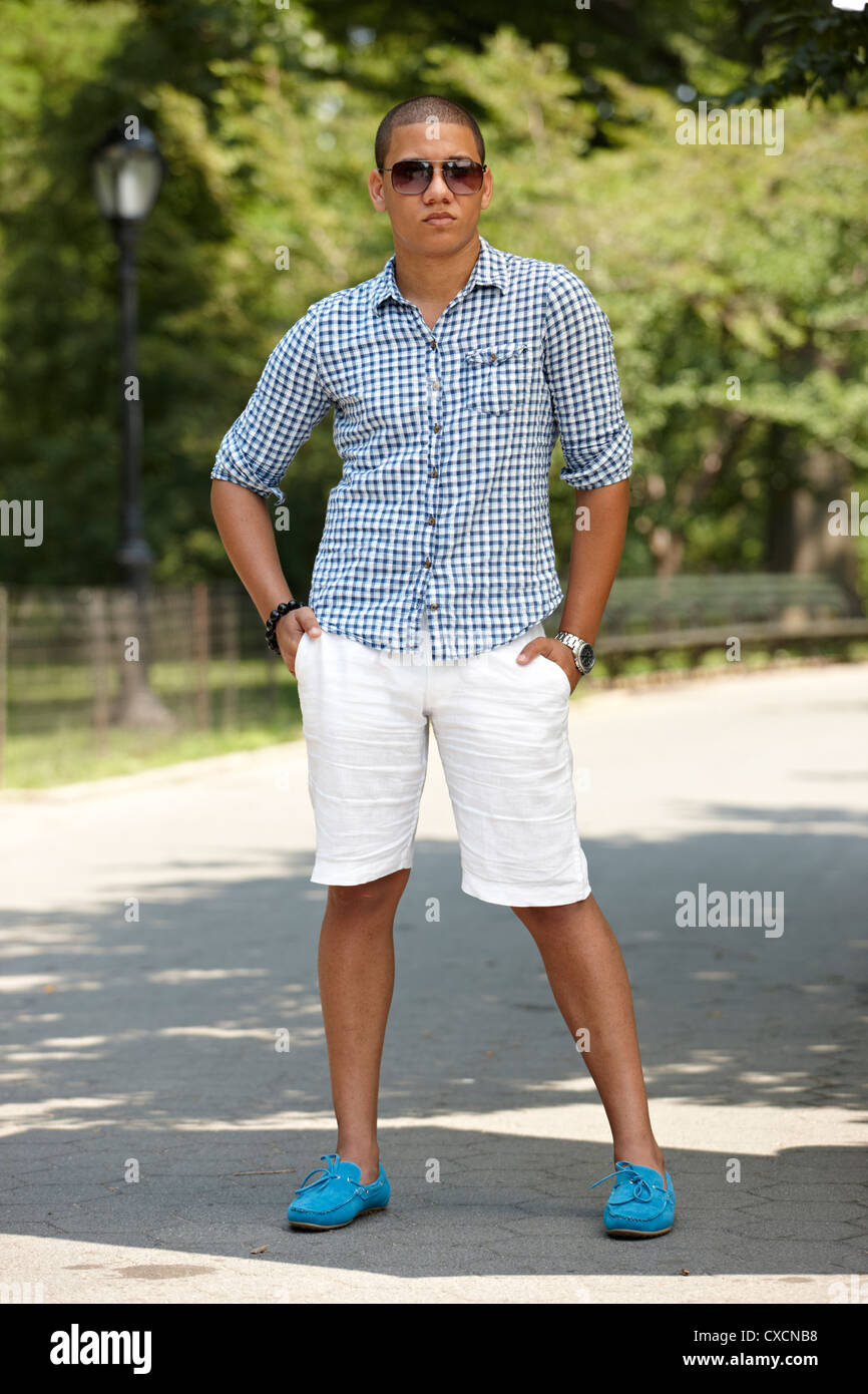 Man standing on path in park Stock Photo - Alamy