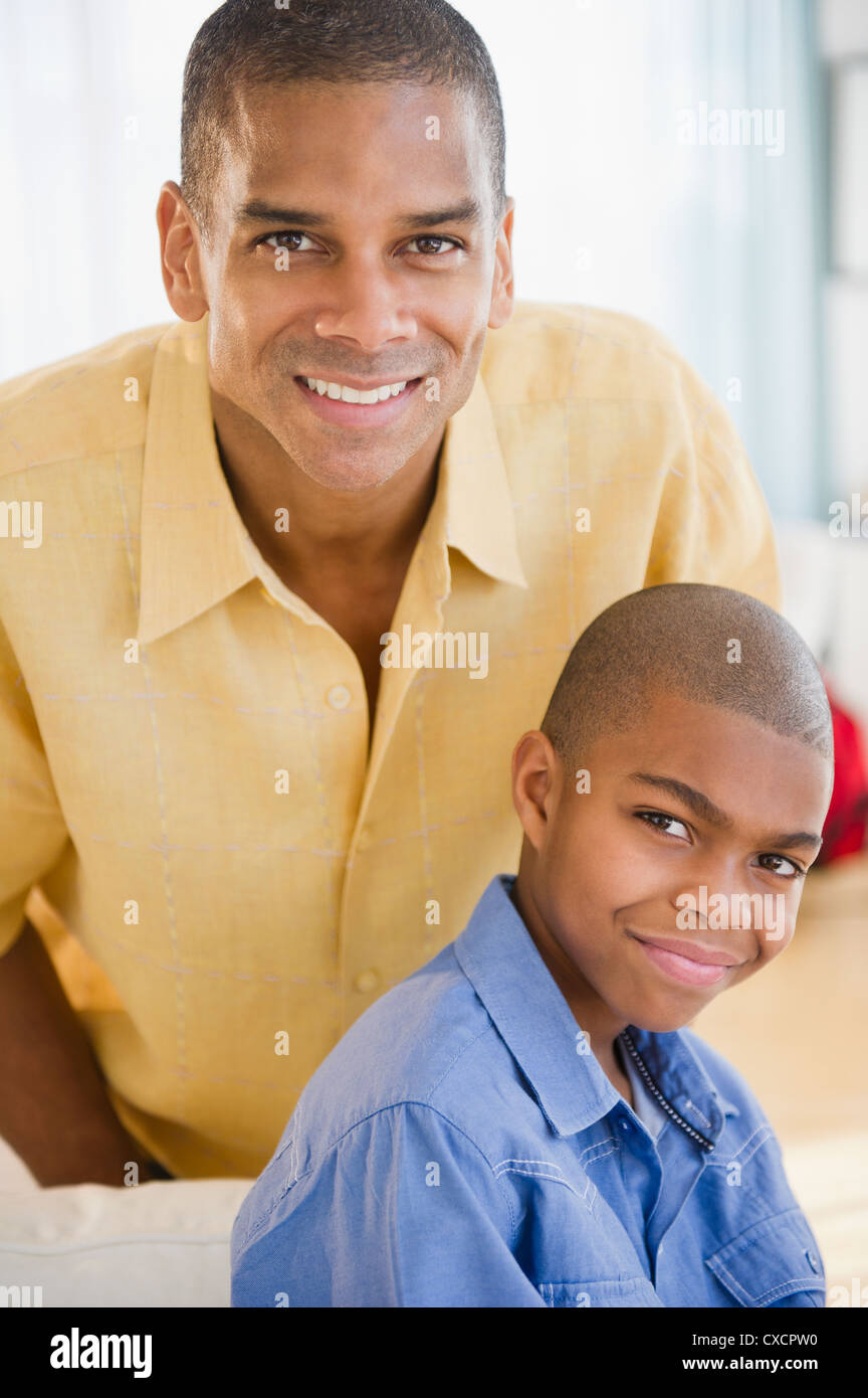 Smiling father and son Stock Photo - Alamy