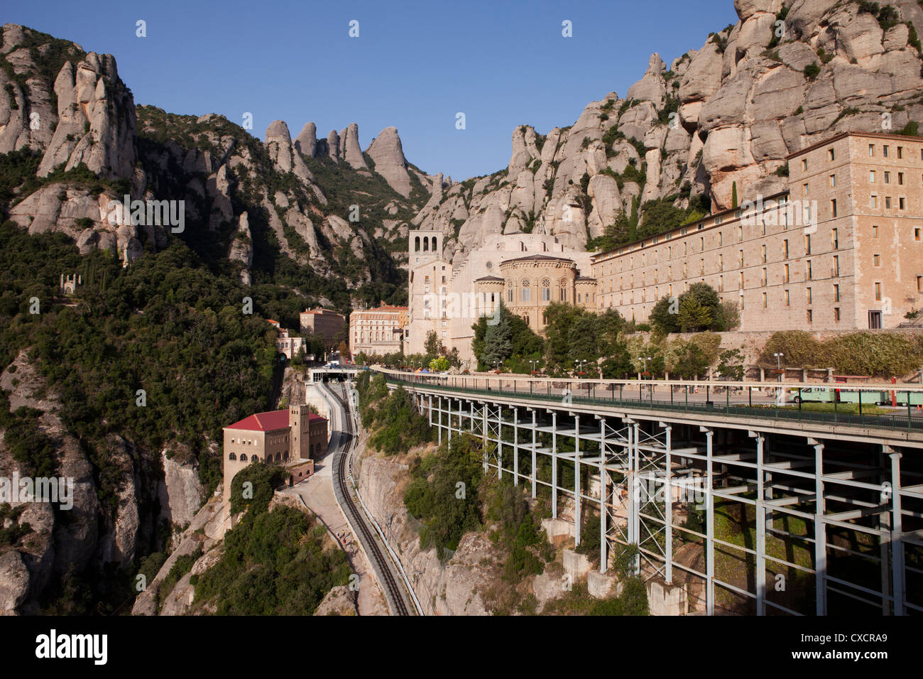 A front view of Montserrat with mountains in the background and above ...