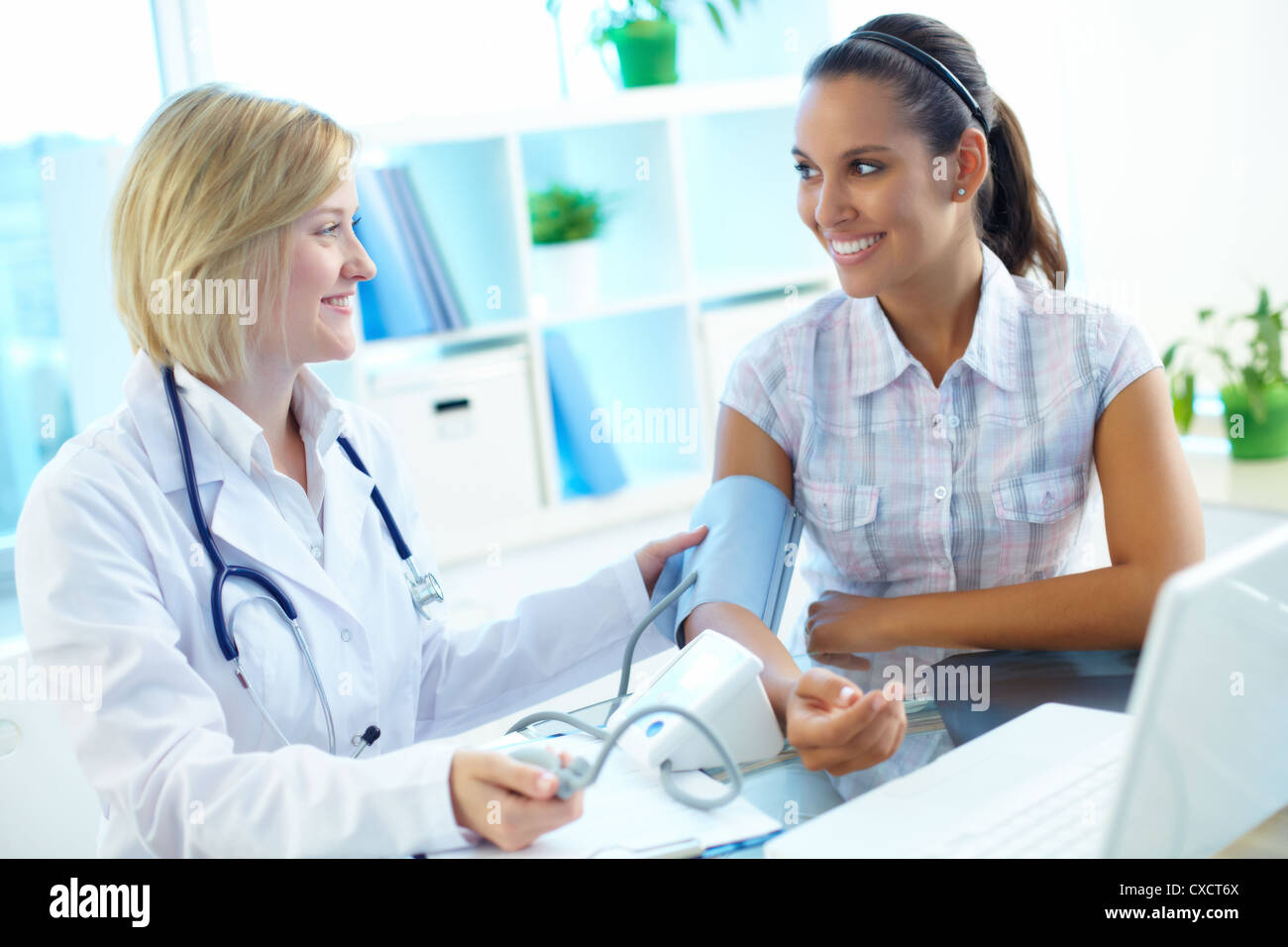 Image of doctor measuring pressure of patient on tonometer Stock Photo ...