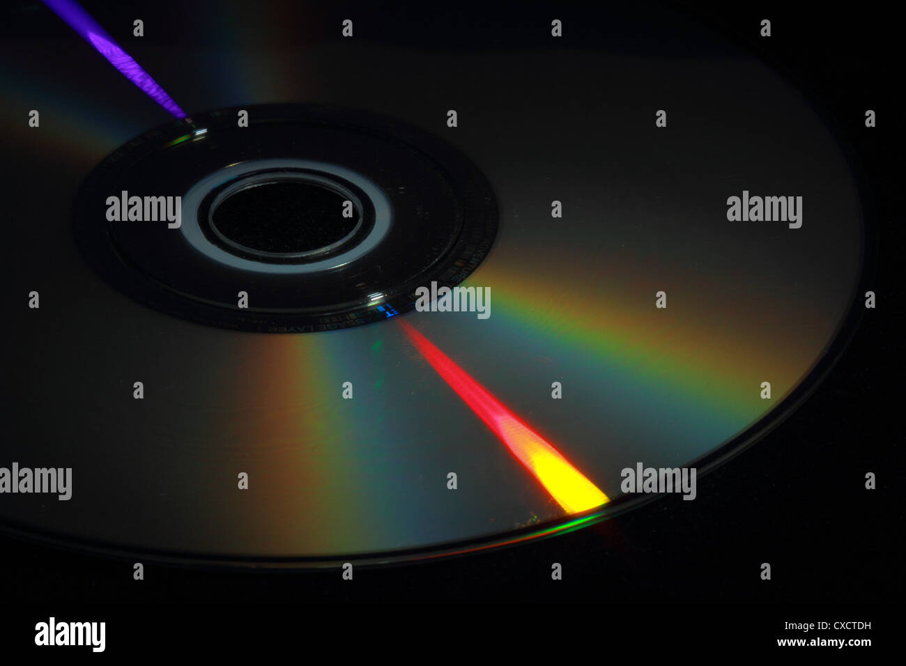 CD in the dark Stock Photo - Alamy