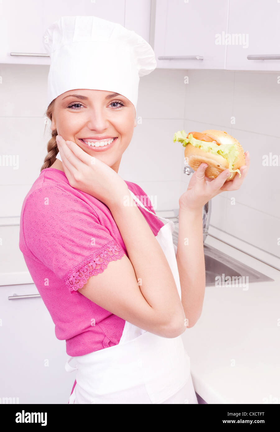 beautiful woman eating a sandwich Stock Photo - Alamy
