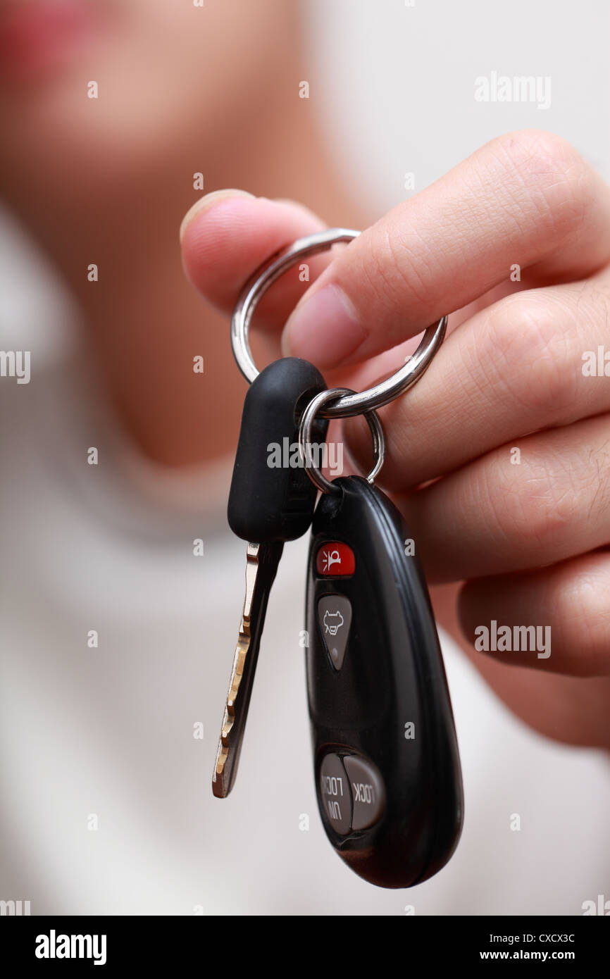 A car key in hand Stock Photo - Alamy