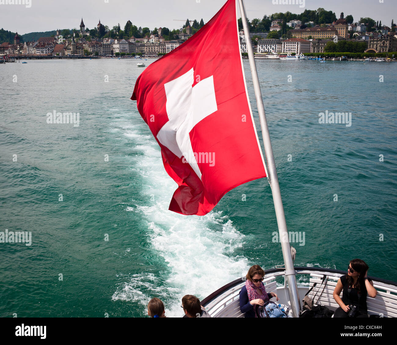 Swiss flag flying on the stern of a Lake Lucerne ferryboat Stock Photo ...