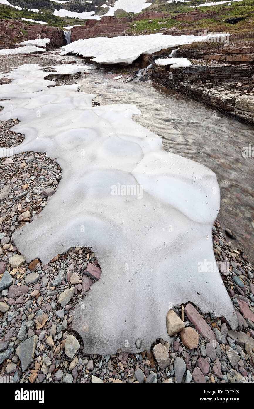 Alpine stream with snow, Glacier National Park, Montana, United States ...