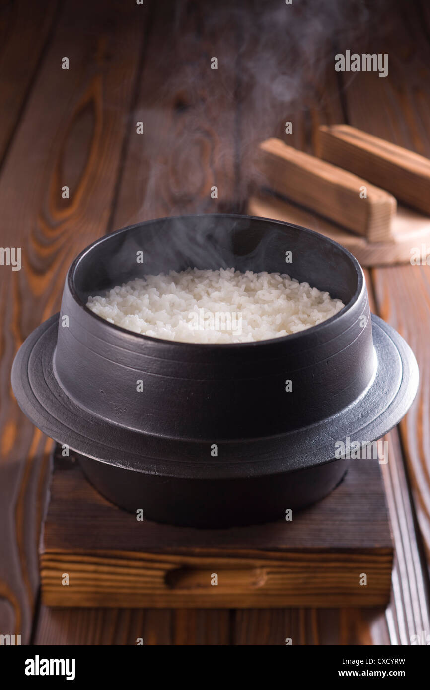Steamed Rice in Iron Pot Stock Photo - Alamy