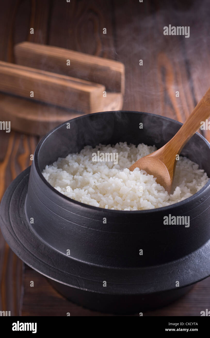 Steamed Rice in Iron Pot Stock Photo - Alamy