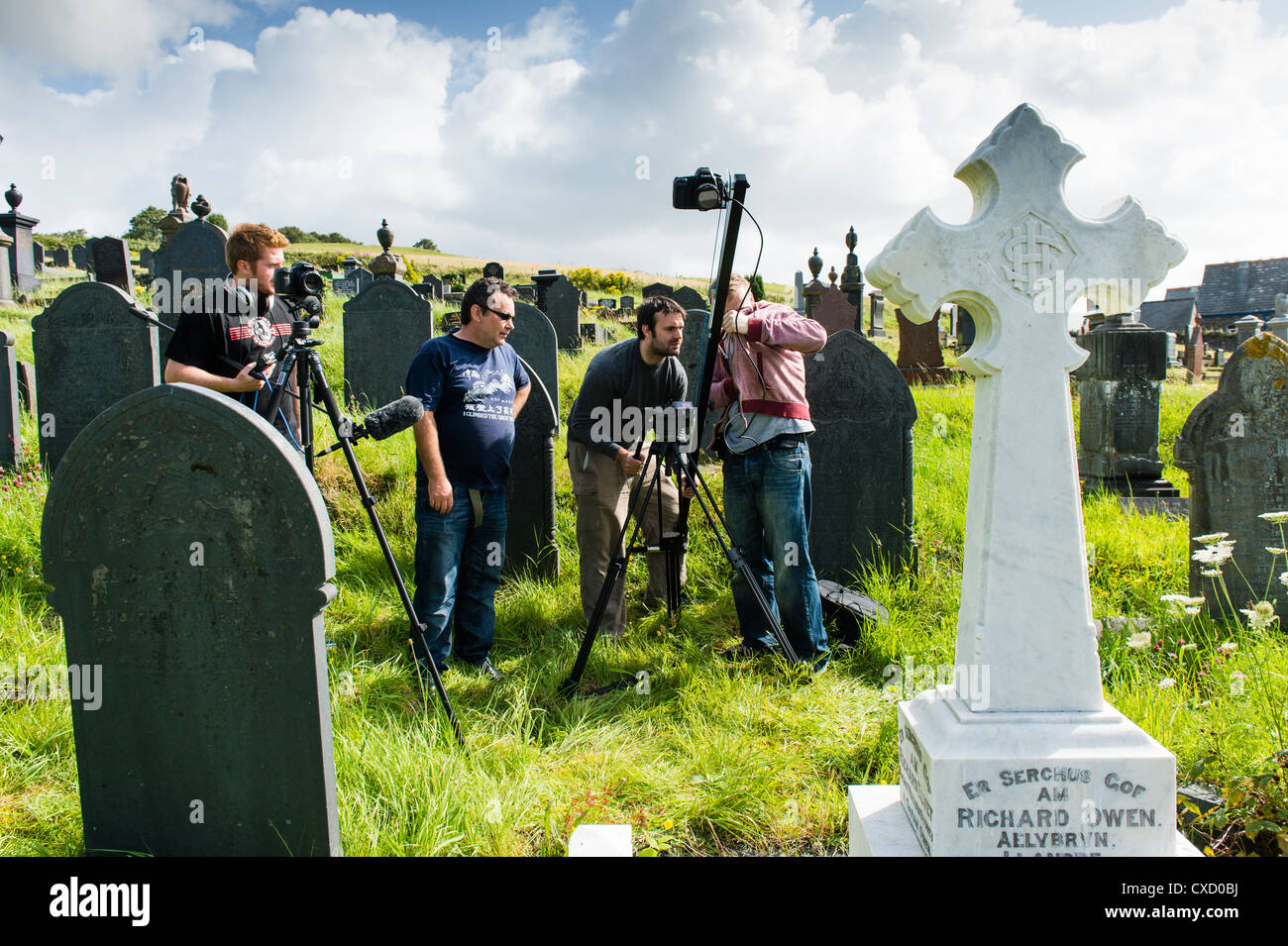 A small film crew making a short film using Canon DSLR cameras on ...