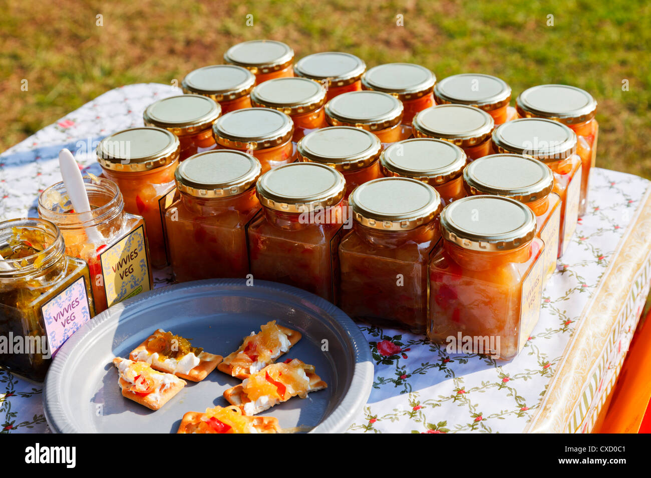 A table with preserves for sale with taste samples Stock Photo - Alamy