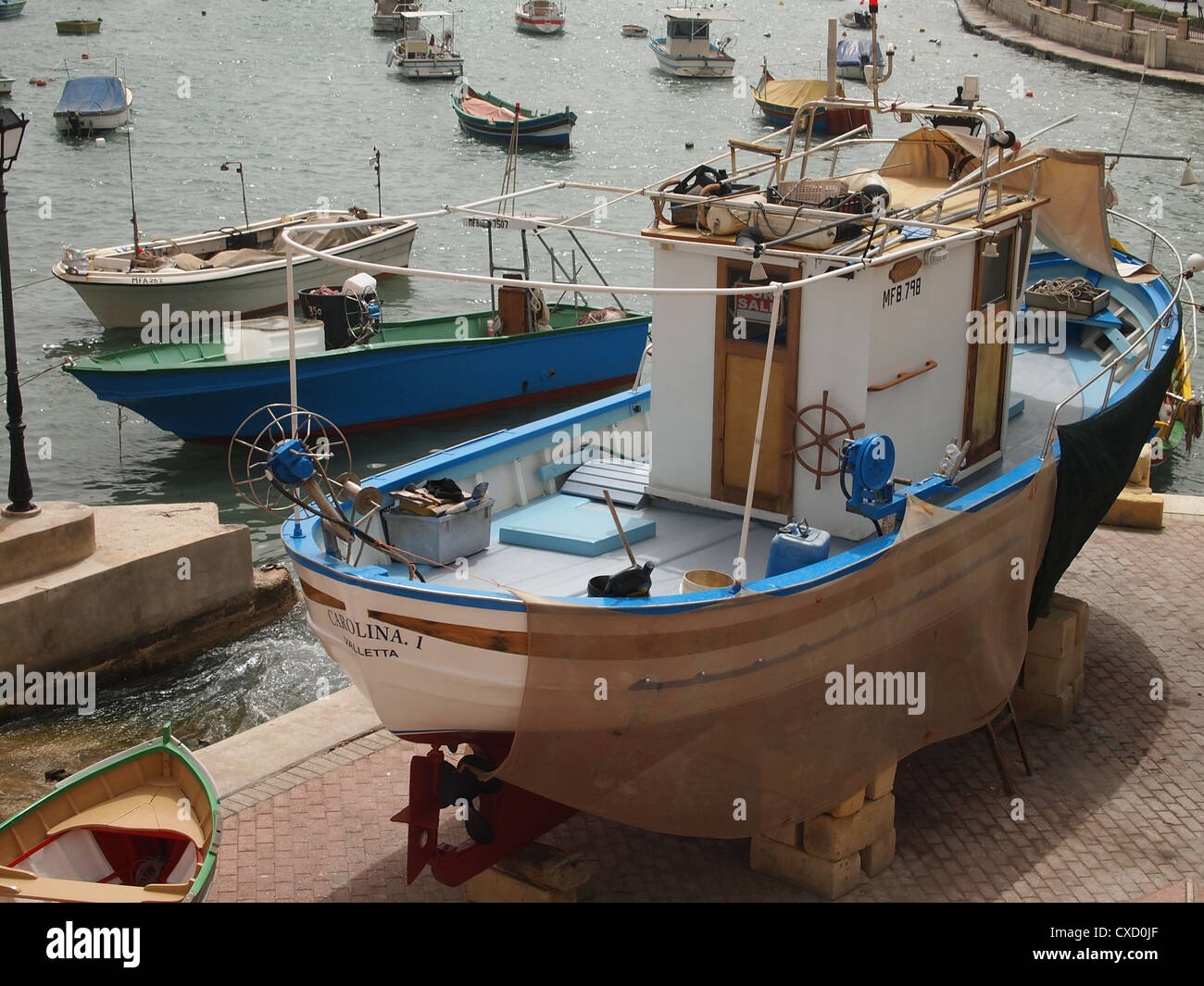 An interesting boat on land Stock Photo - Alamy